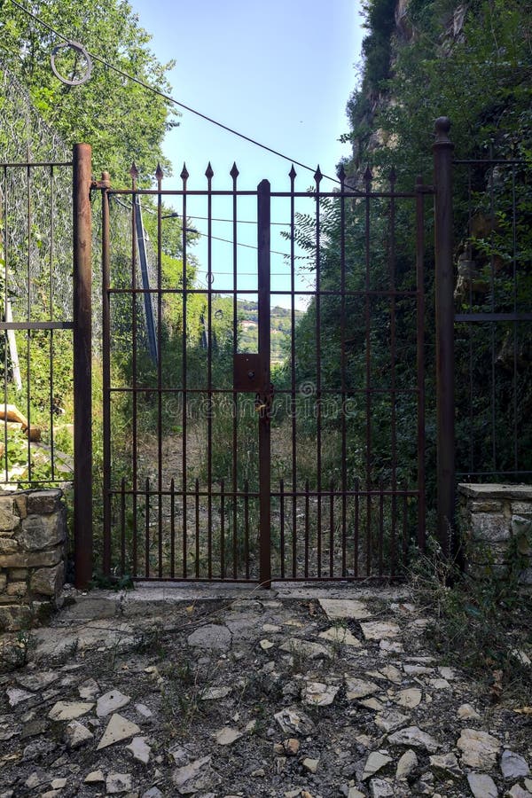 Rusty Gate and Fence at the Entrance of an Abandoned Trail Stock Photo ...