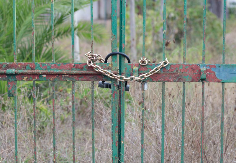 Vintage Rusty Green Gate with Locked Master Key and Chain Stock Photo ...