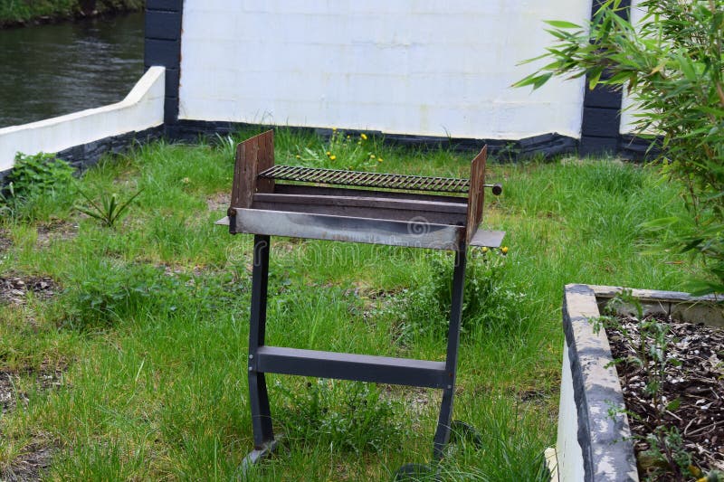 Rusty old barbecue grill stock photo. Image of next - 314510552