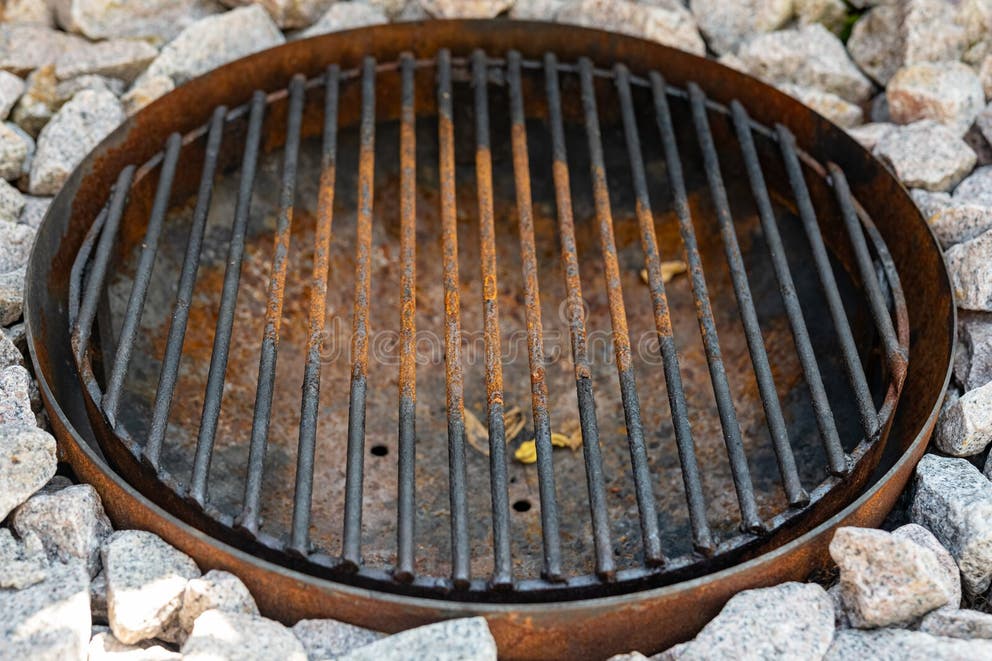 A Rusty Grill on a Stone Floor Stock Photo - Image of outside, barbecue ...