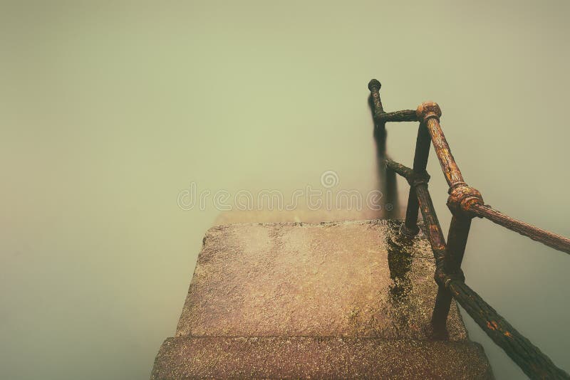 Rusty Handrail Going Down on Water with Vintage Effect Stock Image ...