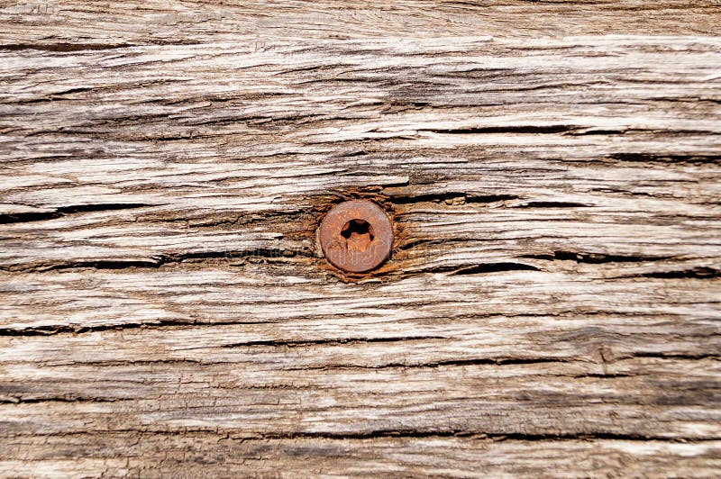 Rusty Hex in Board stock image. Image of weathered, cracks - 30329213