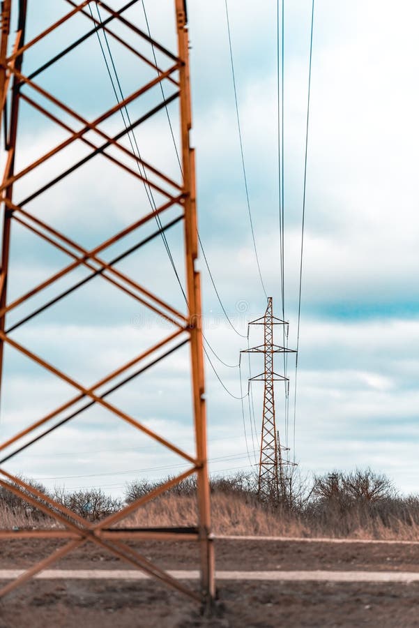 Rusty high-voltage towers stock image. Image of equipment - 141800701