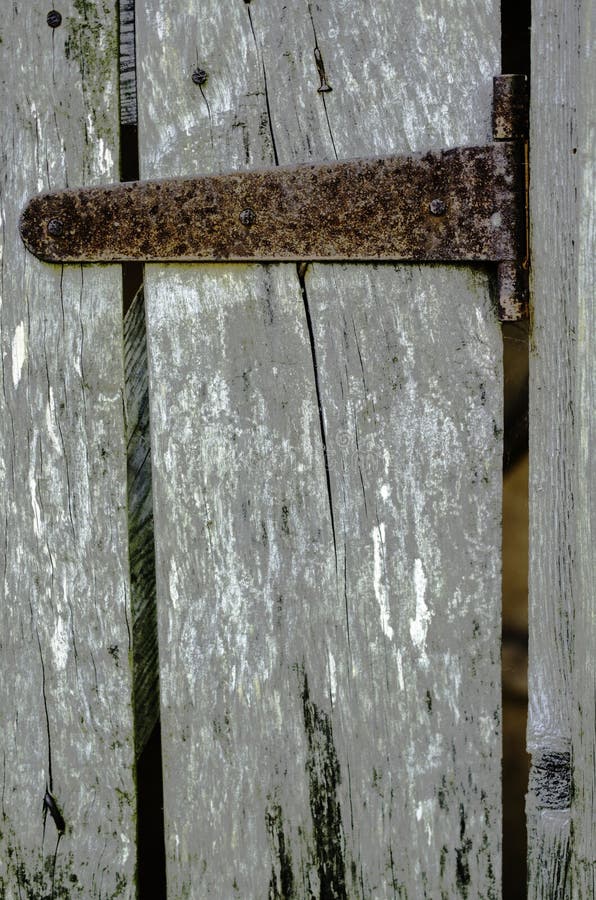 Rusty hinge on the door. stock image. Image of rusty - 71115361