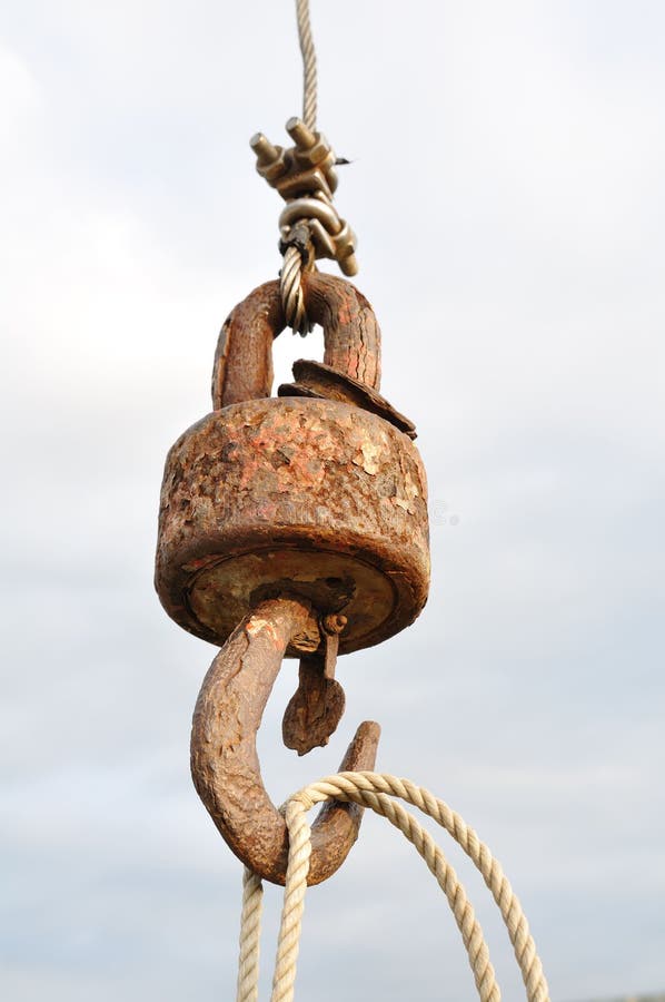 Rusty hook in a rock. stock photo. Image of sunbeam, mooring - 50338994
