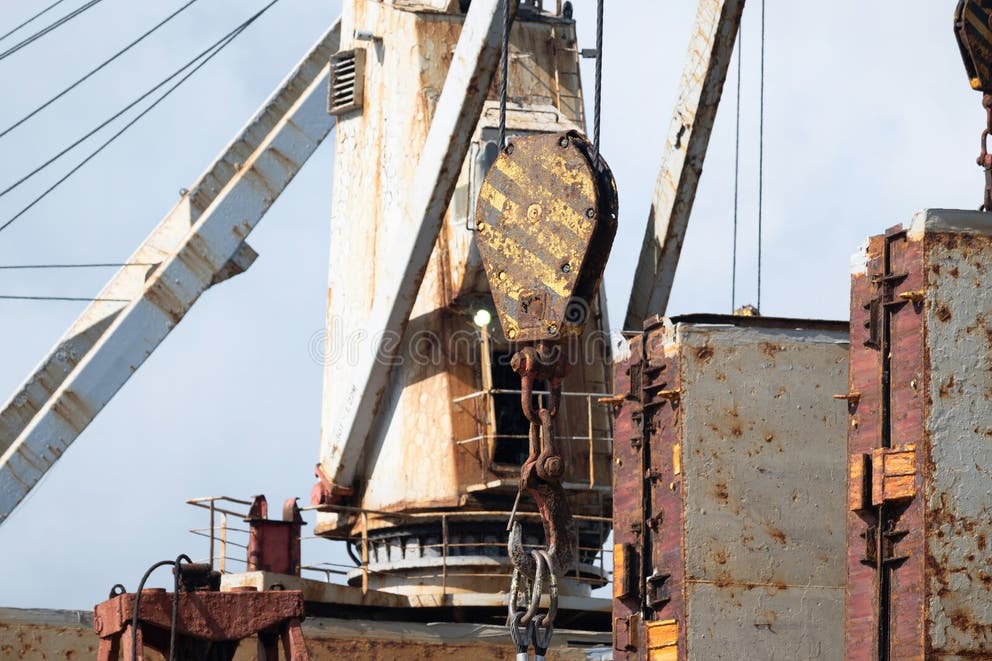 A Rusty Hook of the Deck Crane is Used for Loading Many Containers To ...