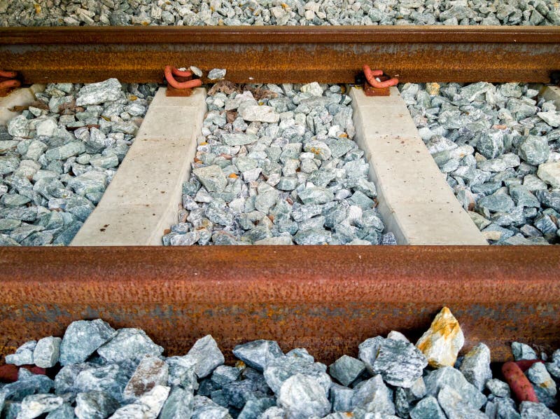 Rusty Inactive Railroad with Concrete Sleepers and Rocks Foundation ...