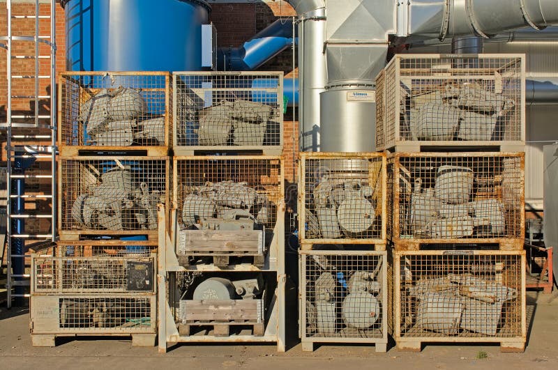 Rusty Metal Wire Mesh Containers with Train Components Stock Image ...