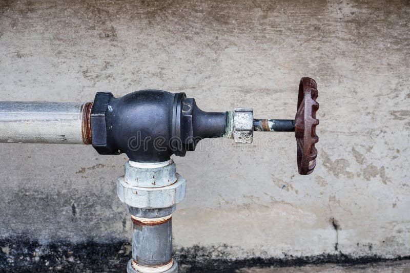 Rusty Industrial Water Pump and Tap on Wall Stock Image - Image of ...