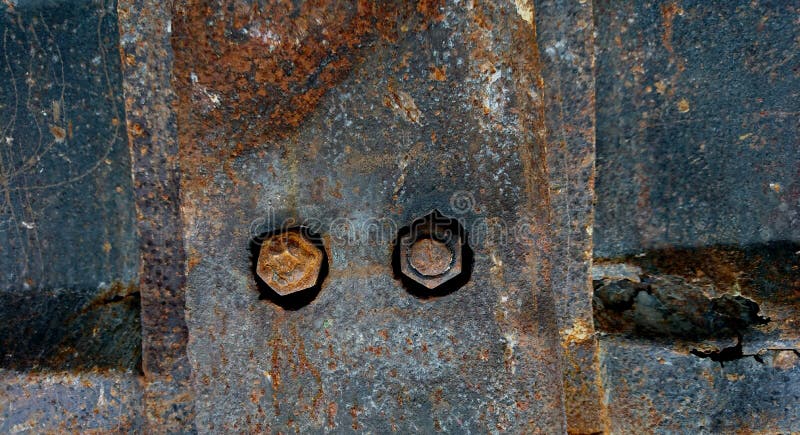 A Rusty Iron Bolt Nut in an Old Metal Pit Stock Photo - Image of ...