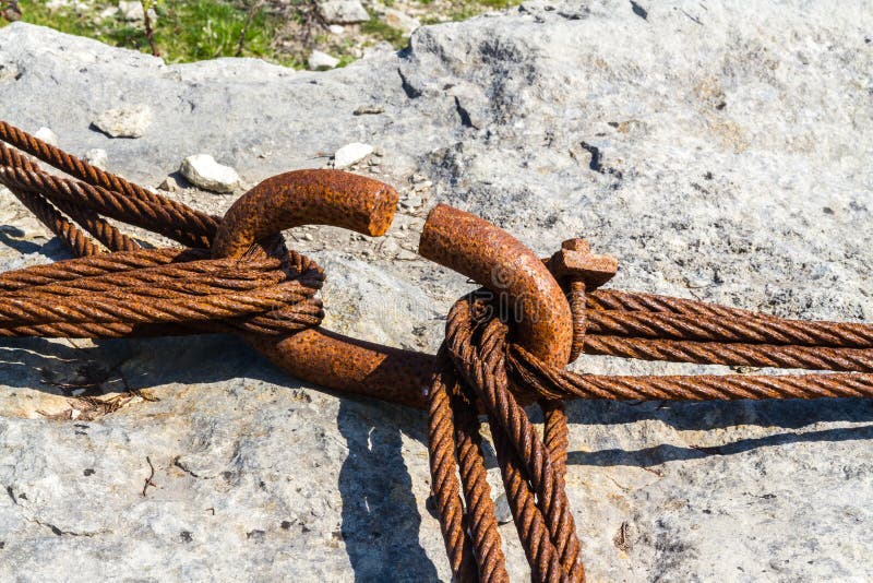 Rusty Iron Cables Linked Around Hoop. Stock Image - Image of linked ...