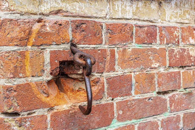 Rusty Iron Hook in the Brickwork of an Old Gate Stock Image - Image of ...