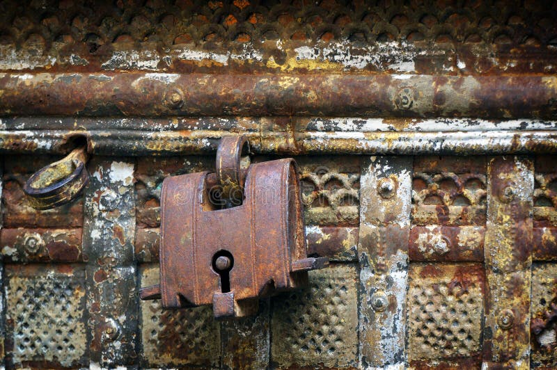 Ancient Iron Lock with Latch on Aged Boarded Door. Stock Image - Image ...
