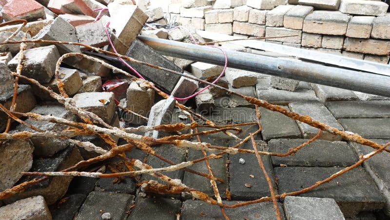 Rusty Iron on a Pile of Bricks Stock Photo - Image of grunge ...