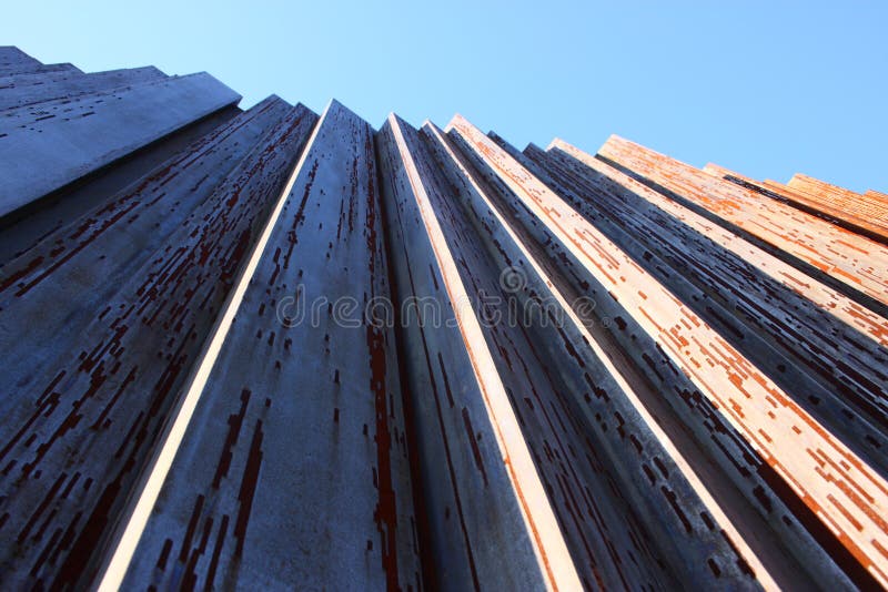 Rusty iron pillars stock image. Image of corrosive, blue - 50410793