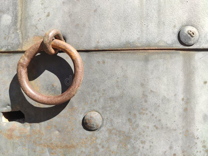 Rusty Iron Ring on Metal Door Stock Image - Image of wood, relief ...