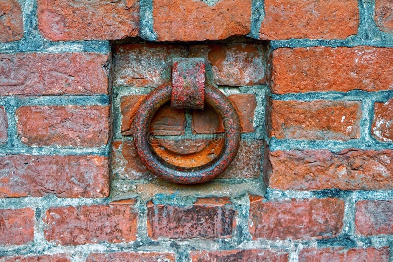 A Rusty Iron Ring in an Old Brick Wall Stock Image - Image of cement ...