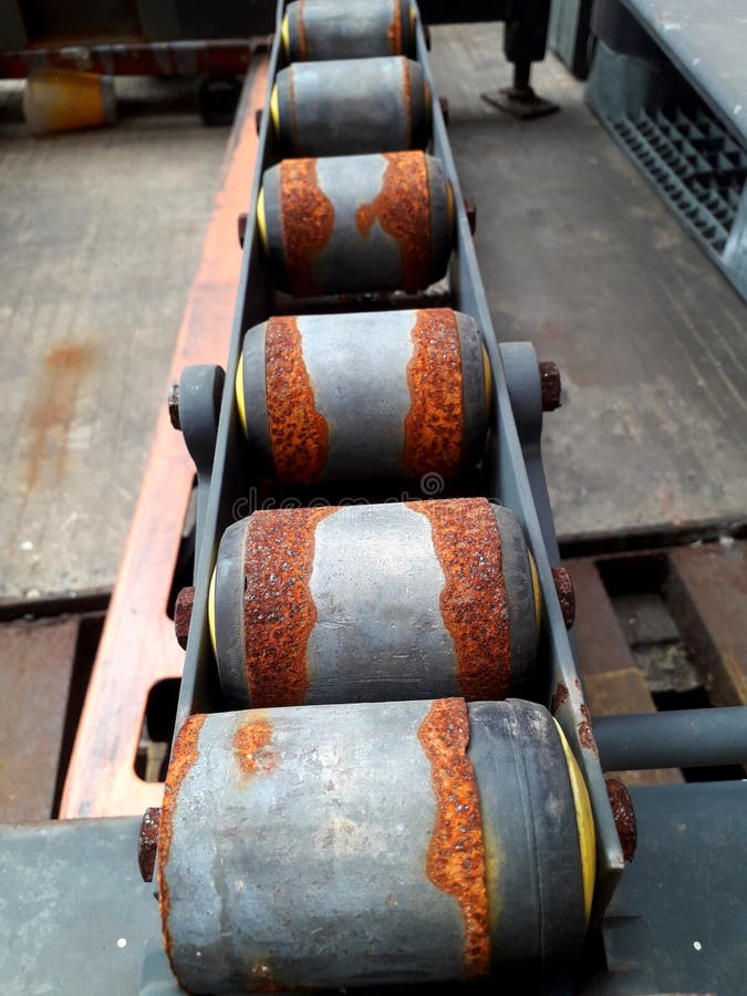 A Rusty Iron Roller in a Used Goods Warehouse Stock Image - Image of ...