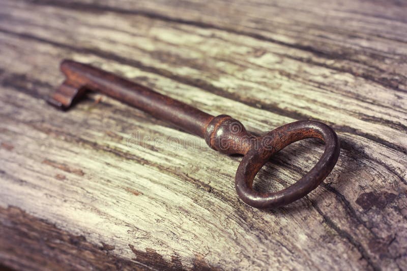 Old Golden Key on a Rusty Grunge Metal Background, Escape Room Concept ...