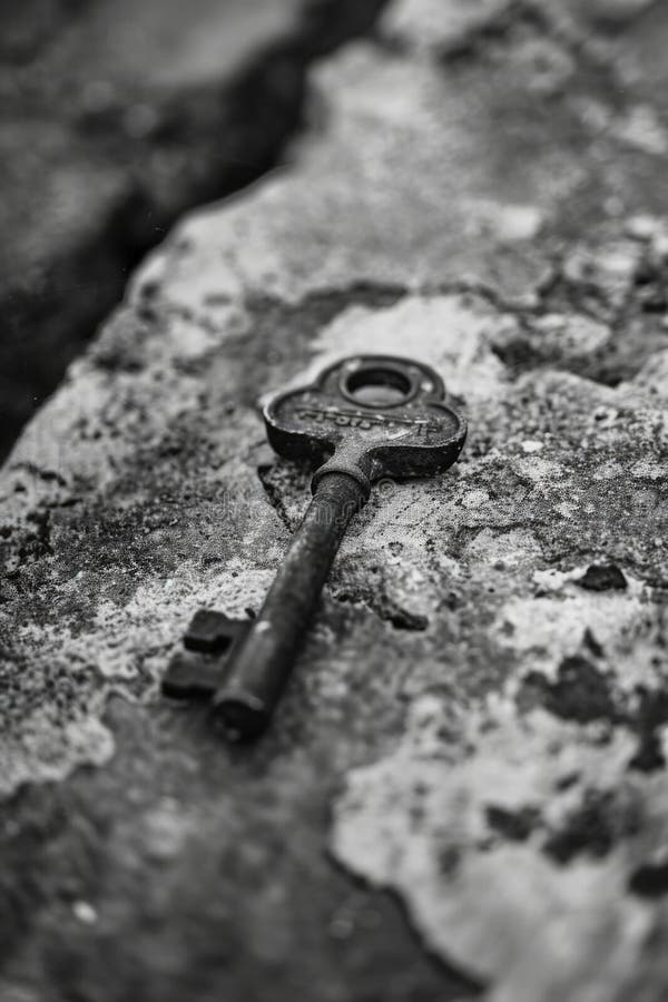 Rusty Key Resting Atop Stone, Stock Image - Image of adventure ...