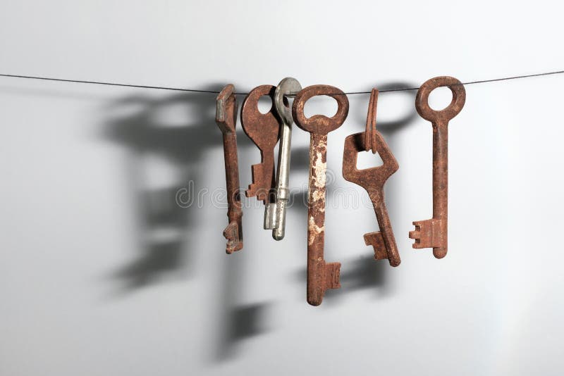 A Different Old Retro Rusty Keys from Different Locks Hanging on String ...