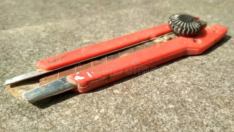 Red cutter with adjustment stock image. Image of rusty - 231343577