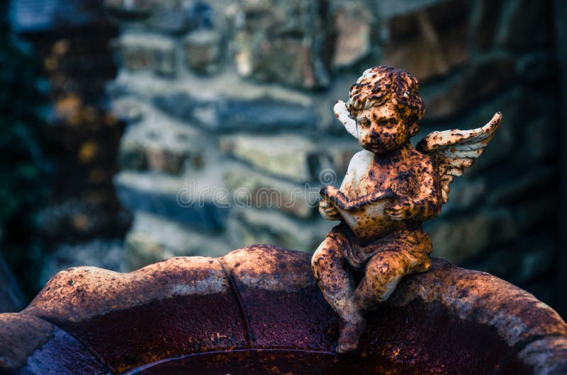 Rusty little angel stock image. Image of hope, blue, saint - 63098213