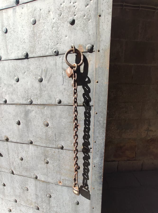 Rusty Lock and Chain on Metal Door Stock Photo - Image of lock, horn ...