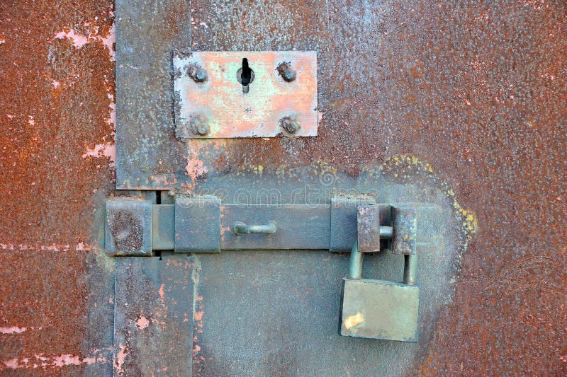 Rusty lock on garage gate stock photo. Image of vintage - 42693288
