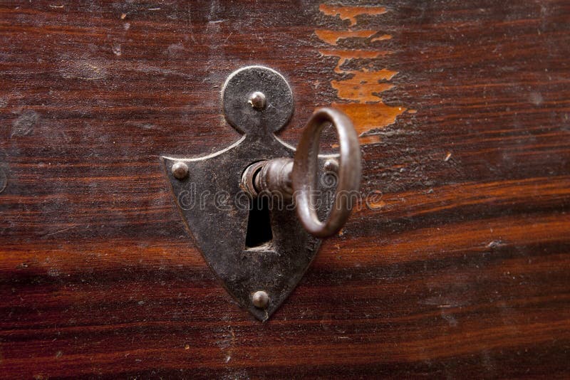Rusty Lock with Old Key on Wooden Chest, Close-up Stock Photo - Image ...