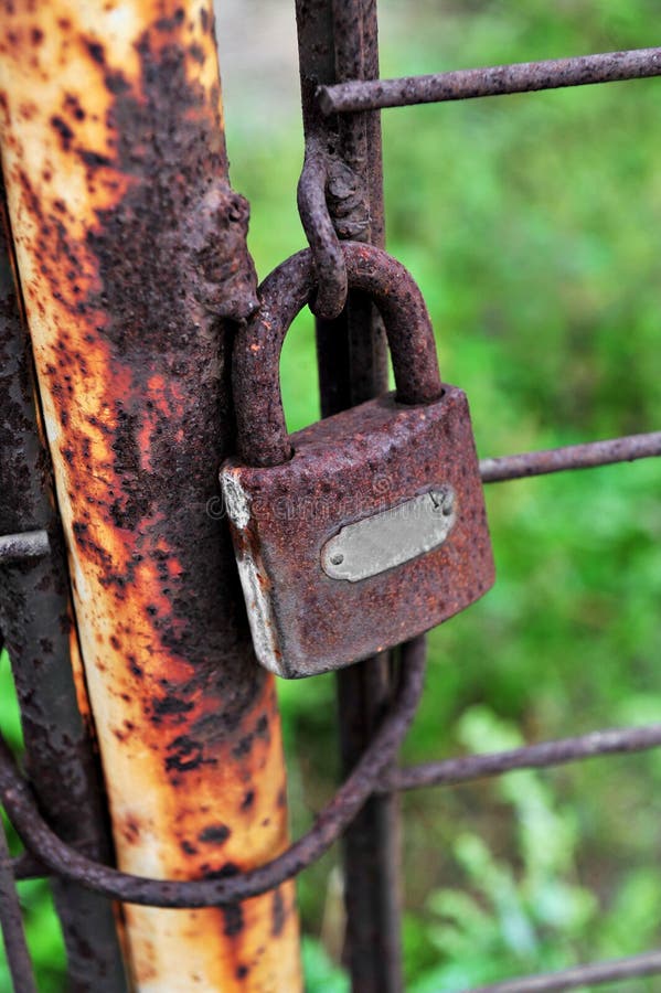 Rusty Lock on Rusty Iron Gate Stock Photo - Image of padlock, detail ...