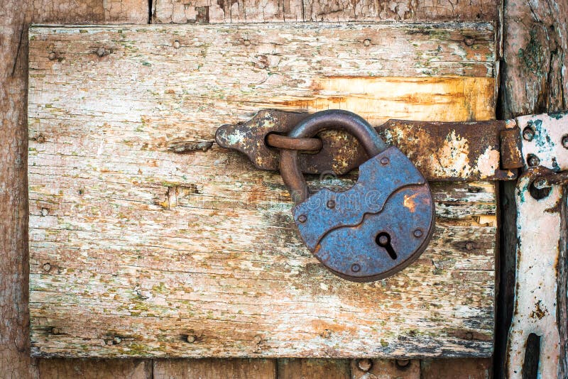 Rusty Lock on a Texture of Old, Orange Door, Which the Old Beige Paint ...
