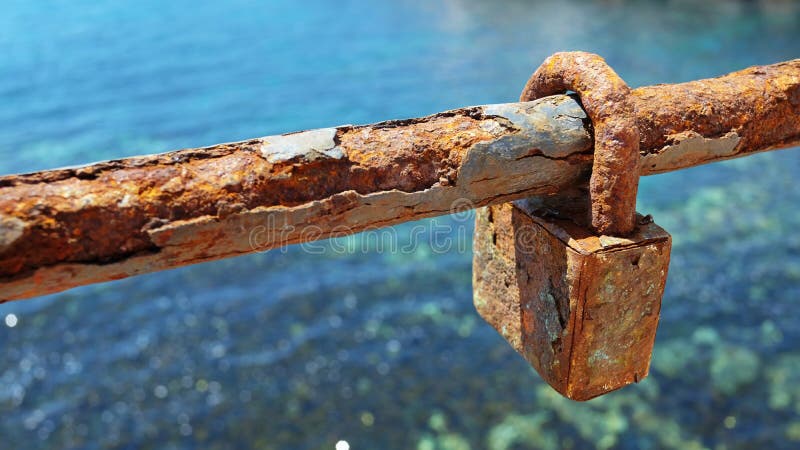 Rusty Love Lock or Padlock on a Section of the Chain Link Fence Stock ...