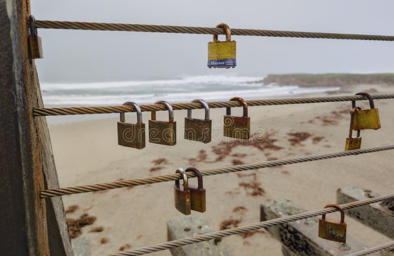 Rusty Love Locks on Pudding Creek Bridge with the Ocean in the ...