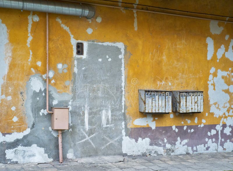 Rusty Mailboxes on Cracked Stucco Wall Stock Photo - Image of container ...