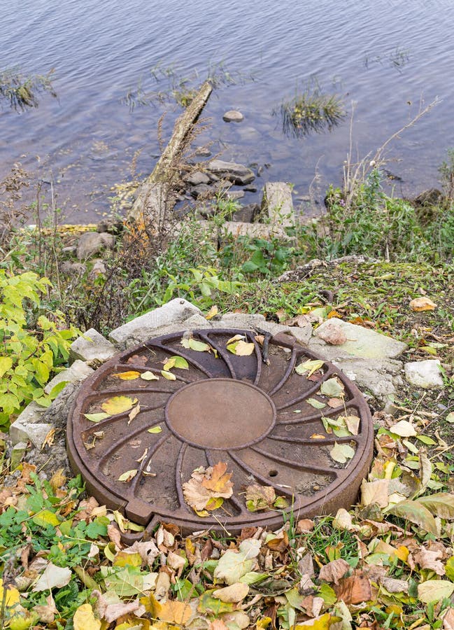 Rusty manhole cover stock photo. Image of disposal, drain - 155243728