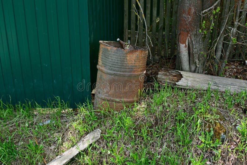 Rusty metal barrel stock photo. Image of ecology, pile - 94426156