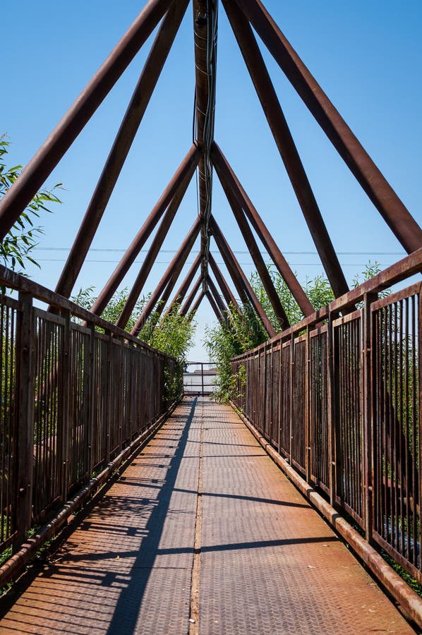 Rusty Metal Bridge Across the River Stock Photo - Image of green ...