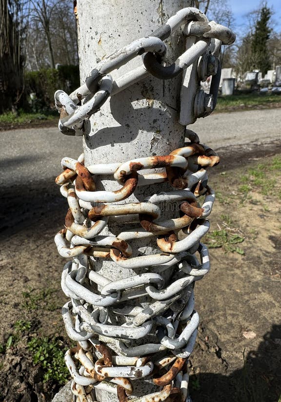 Rusty Metal Chain on a Pole Outdoor Stock Image - Image of closeup ...