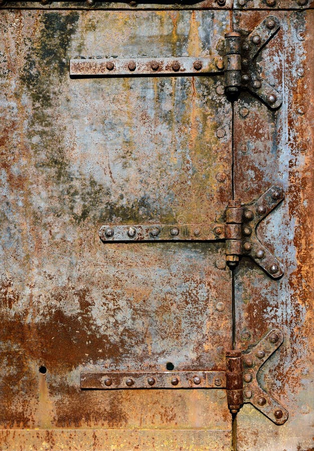 Rusty metal door details stock image. Image of steel - 58706737