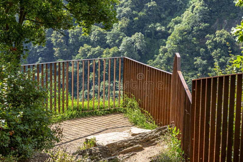 Rusty Metal Fence at the Edge of the River Valley, Visible Trees on the ...