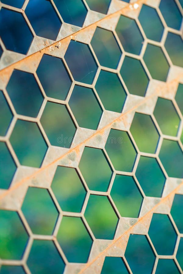 Rusty Metal Fence in a Hex Shape Stock Image - Image of mesh, texture ...