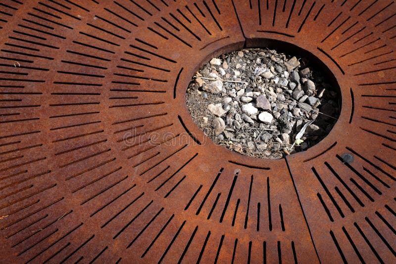 Rusty Metal Grate with Rock and Soil Circle Shaped Stock Photo - Image ...