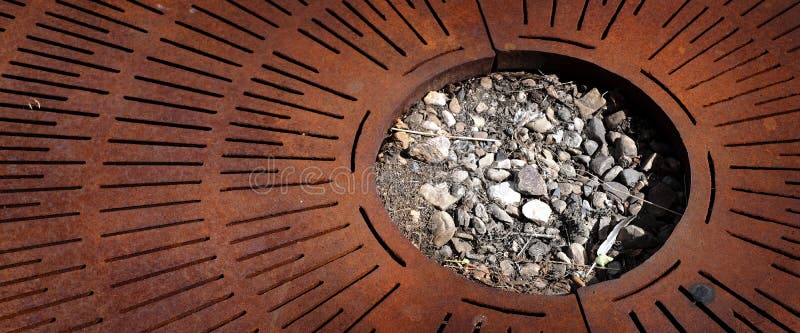 Rusty Metal Grate with Rock and Soil Circle Shaped Stock Photo - Image ...