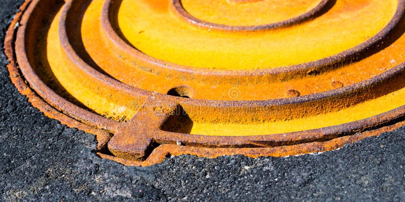 Rusty metal manhole cover stock photo. Image of confined - 60463626