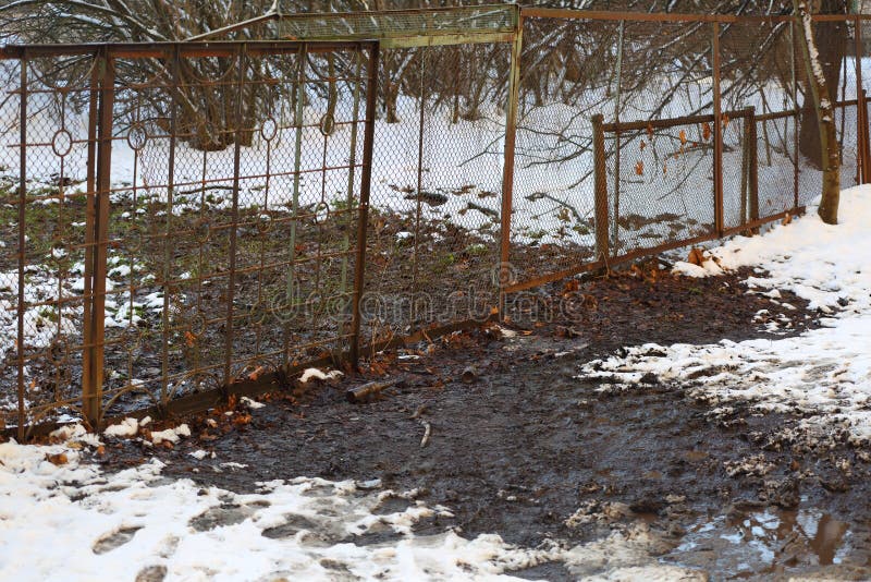 Rusty Metal Mesh Fence during the Winter Thaw Stock Image - Image of ...