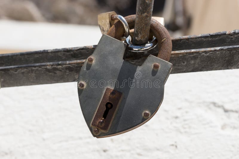 Rusty Metal Padlock on the Railing Stock Photo - Image of closed, heart ...