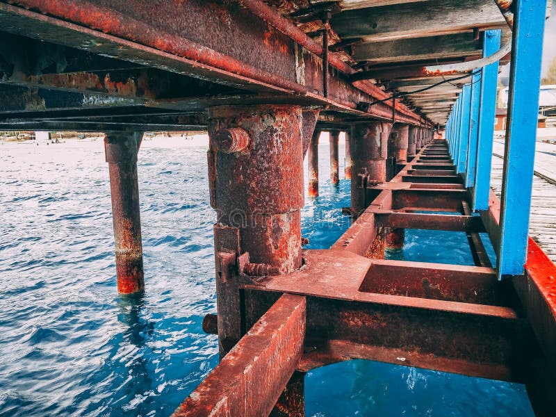 Rusty metal pier support. stock photo. Image of system - 127631526