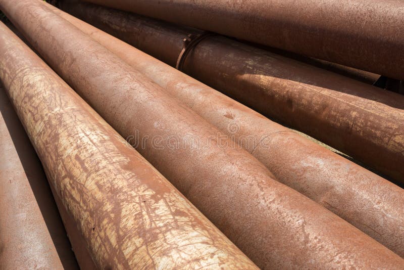 Rusty metal pipes stack stock image. Image of cylinder - 50052345