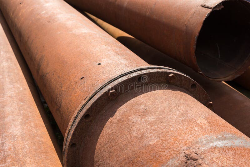 Rusty metal pipes stack stock photo. Image of large, industrial - 50071280